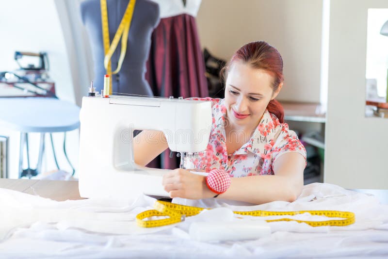 Seamstress at work stock photo. Image of material, machine - 44401456