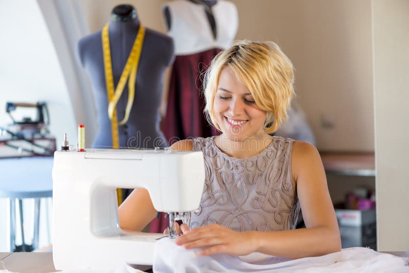 Seamstress at work stock image. Image of adult, occupation - 44401583