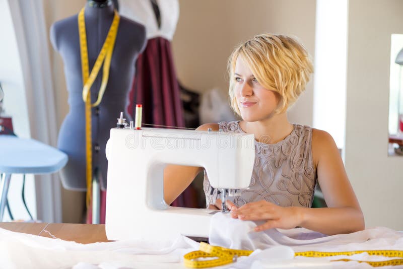 Seamstress at work stock image. Image of machine, needlework - 44495535