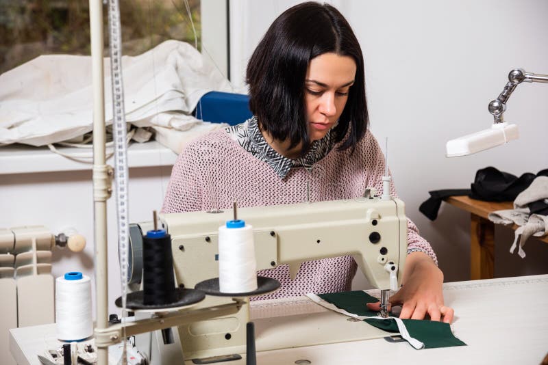 Seamstress Works in the Tailoring Workshop Stock Image - Image of ...