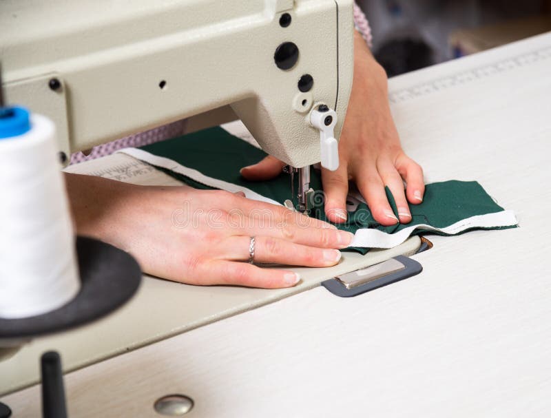 Seamstress Works in the Tailoring Workshop Stock Photo - Image of ...