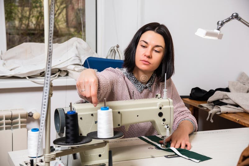 Seamstress Works in the Tailoring Workshop Stock Image - Image of ...