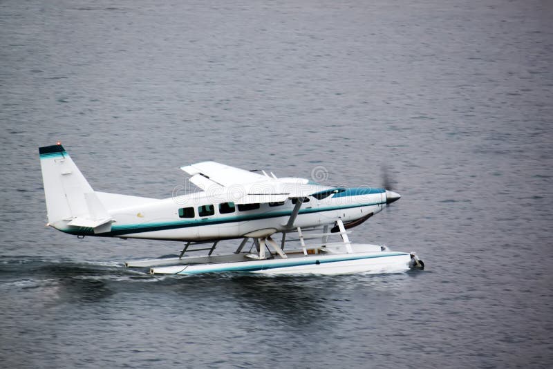 Seaplane Preparing for Takeoff in Water Stock Image - Image of watery ...
