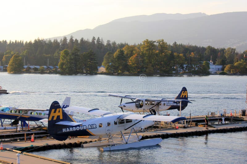 Seaplanes in Vancouver Harbor in the Sunset Light, British Columbia ...