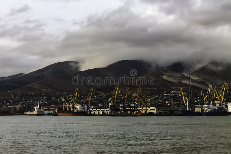 Moored for Unloading / Loading Sea Ships Against the Background of ...