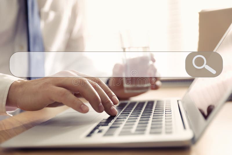 Search Bar of Internet Browser and Man Working with Laptop in Office ...