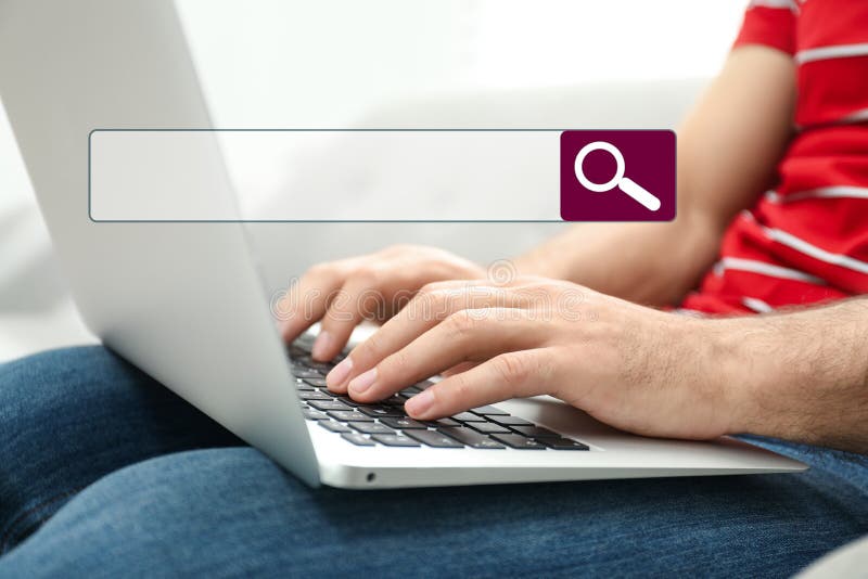 Search Bar of Internet Browser and Man Working on Modern Laptop at Home ...