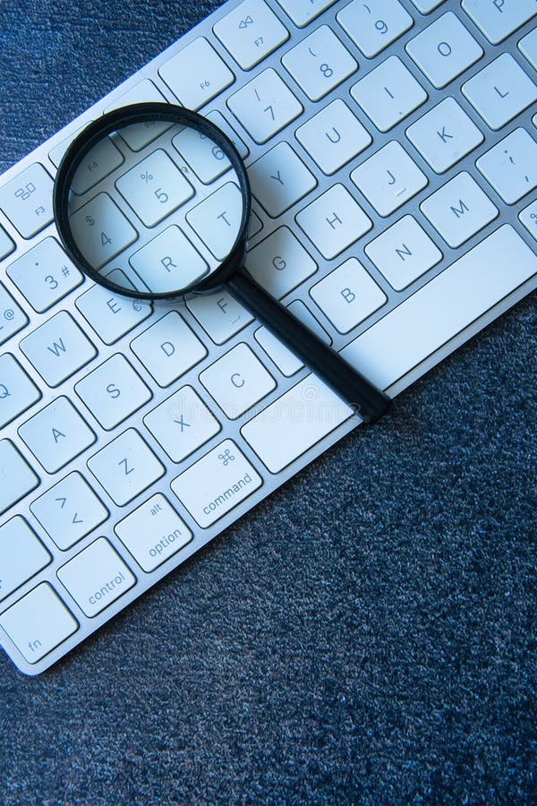 Search Engine Optimization. Keyboard and Magnifying Glass Stock Image ...