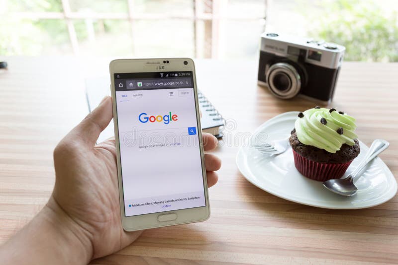 Search Google at Phone in Coffee Shop Editorial Image - Image of ...