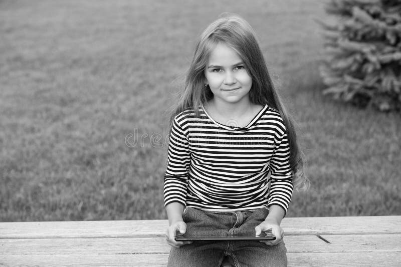 In Search of Incredible. Small Kid Use Tablet Summer Outdoors. Tablet ...