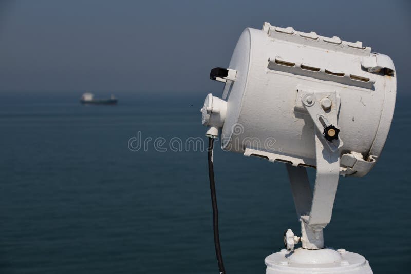 Search Light and a Ship in the Distance Stock Image - Image of navigate ...