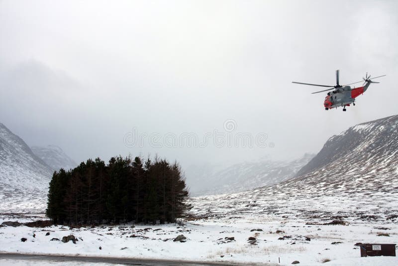 Search and Rescue Helicopter Stock Image - Image of mountains, winter ...