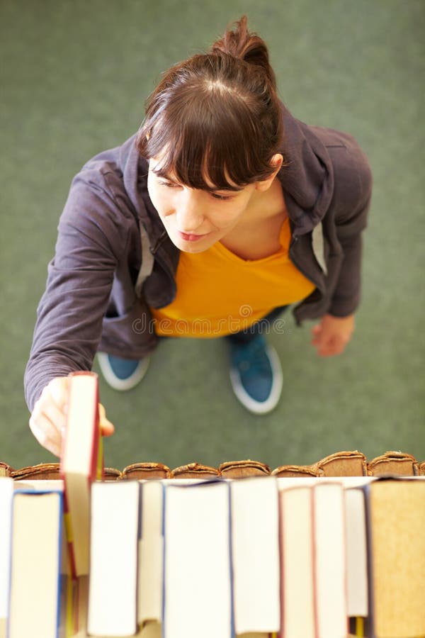 Searching a book stock image. Image of education, industriousness ...