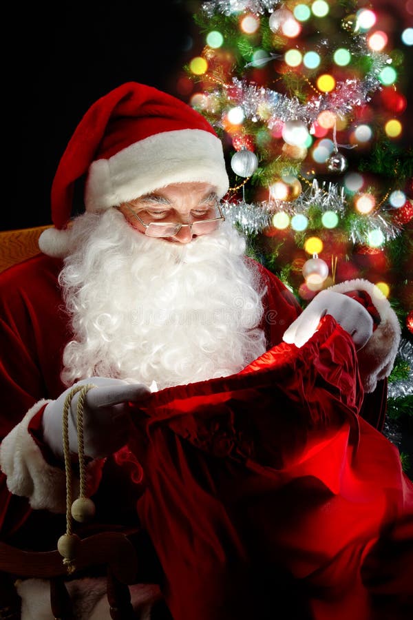 Searching for gifts stock image. Image of mature, claus - 16328691