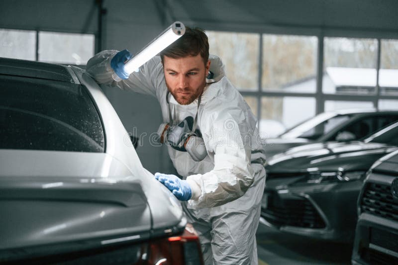 Searching Imperfections Garage Worker Holding Lighting Checking Surface ...