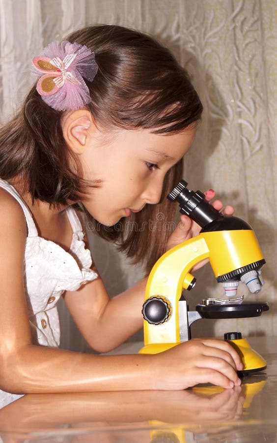 Serching Something New by Looking through the Microscope Stock Image ...