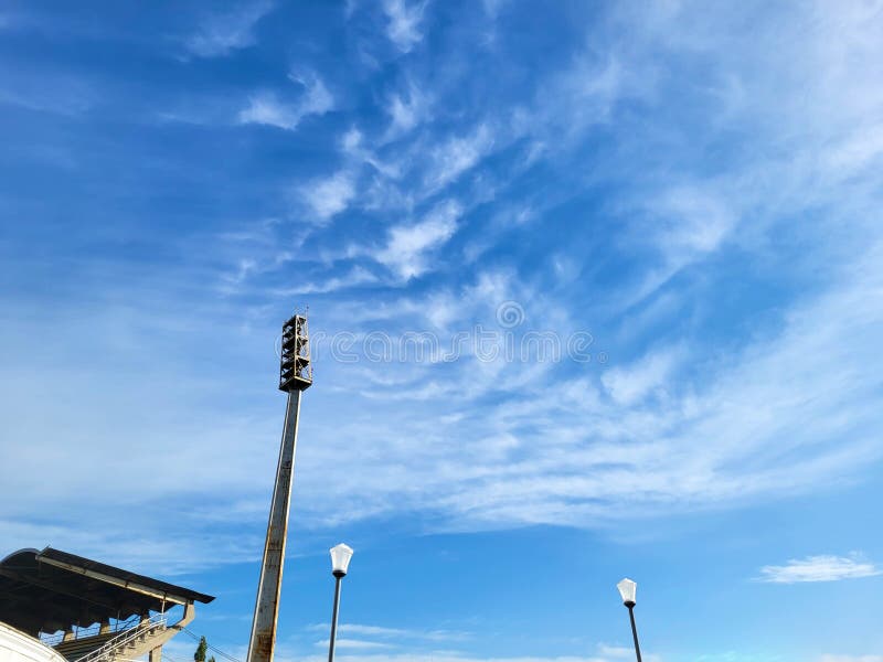 Searchlight Lighting Mast Against Blue Sky Background Stock Photos ...