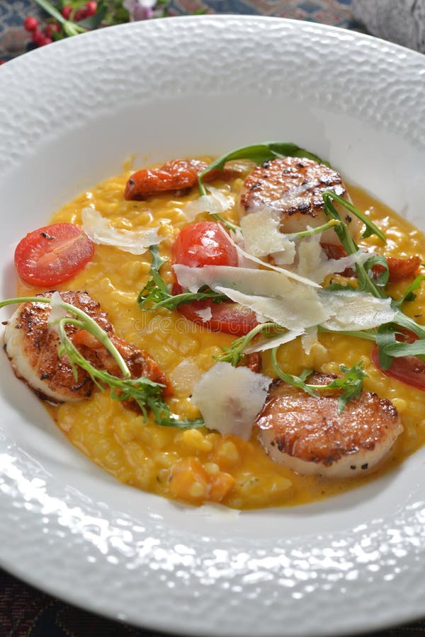 Seared Scallop Risotto stock photo. Image of platter - 70533196