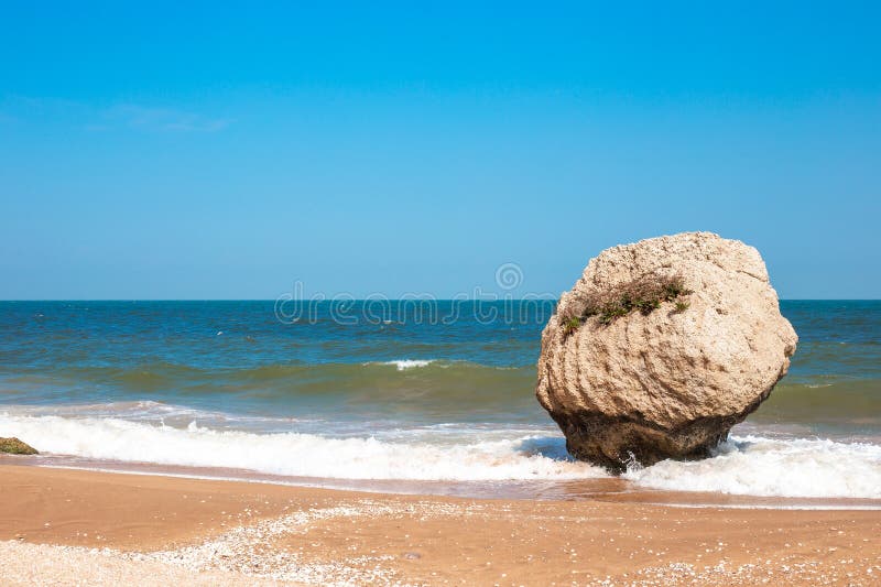 Seascape. a Large Bizarre Stone in the Sea, Washed by the Waves Stock ...