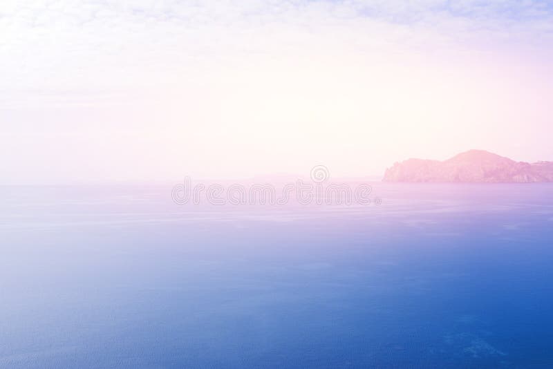 Seascape Overlooking the Mountain. Colorful Sky Over the Ocean Stock ...