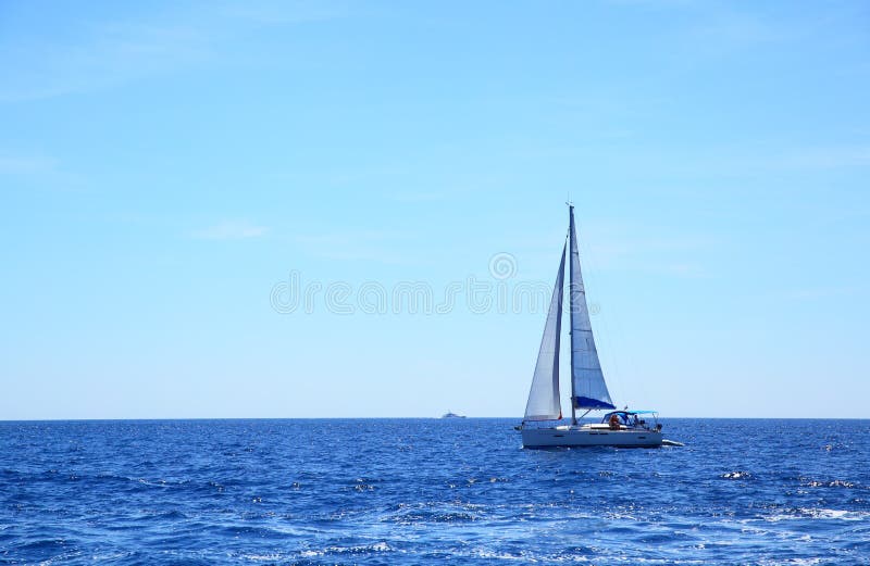 Seascape with sail boat stock photo. Image of ocean, clouds - 94964334