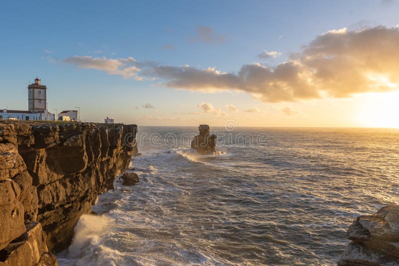 Seascape at Stone Cliffs at Sunset - Lighthouse on an Elevation Stock ...