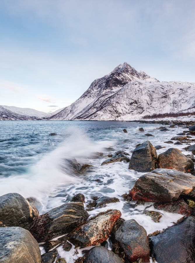 Seascape Wave Hitting Rocks with Mountains on Arctic Coastline Stock ...