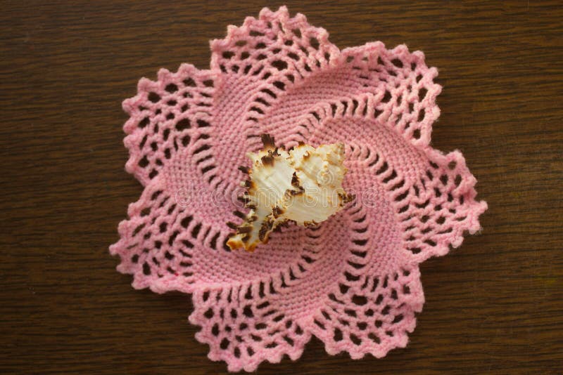 Seashell is Located on the Pink Crochet Doily Stock Image - Image of ... Seashell is Located on the Pink Crochet Doily Stock Image - Image of ...