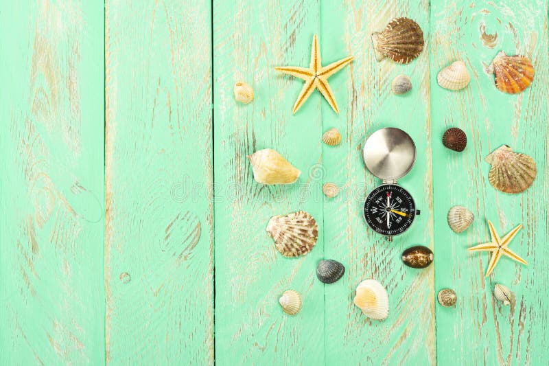 Compass and Seashells on a Bright Yellow Background Stock Photo - Image ...
