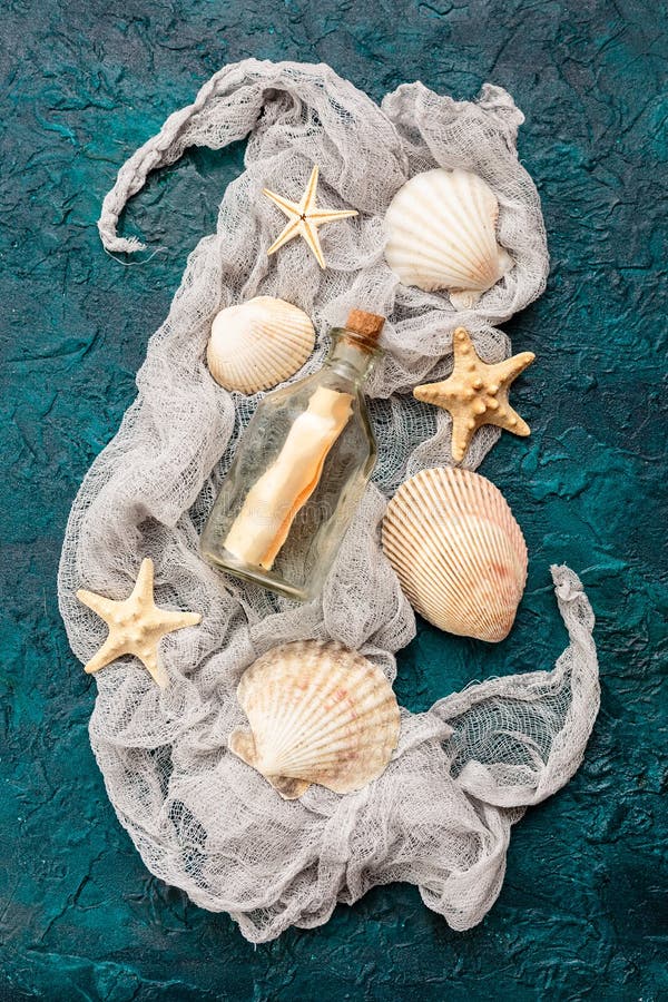 Seashells on Dark Turquoise Background Stock Image - Image of note ...