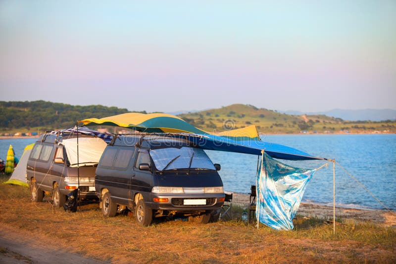 Seashore Camping with Two Vans Stock Photo - Image of beach, summer ...