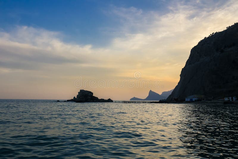 Seashore with Cliffs at Sunset Sea Sky Rock Coast Stock Image - Image ...