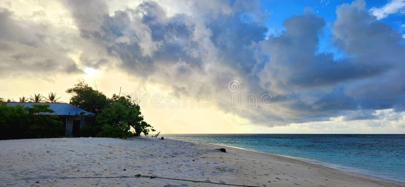 Seashore with Cloudy Sunlight Stock Photo - Image of horizon, sunlight ...