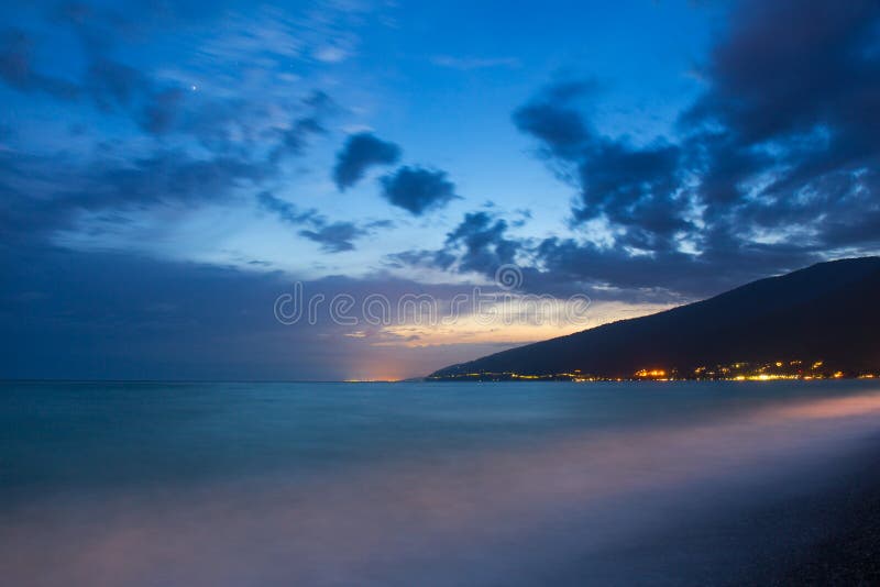 Seashore at Night stock photo. Image of light, landmark - 34499592