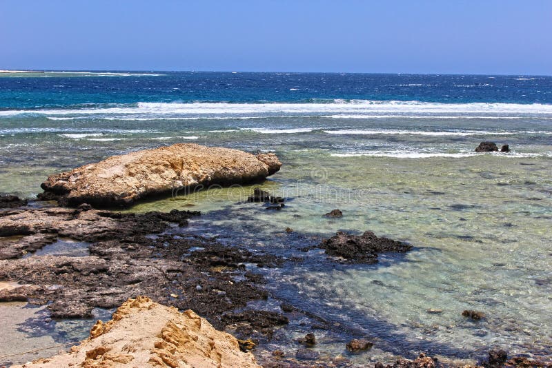 Seashore with the rocks stock image. Image of sunrise - 52419947