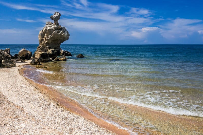 Seashore, Shell Beach and Rocks Stones of Bizarre Frame on Clear Day ...