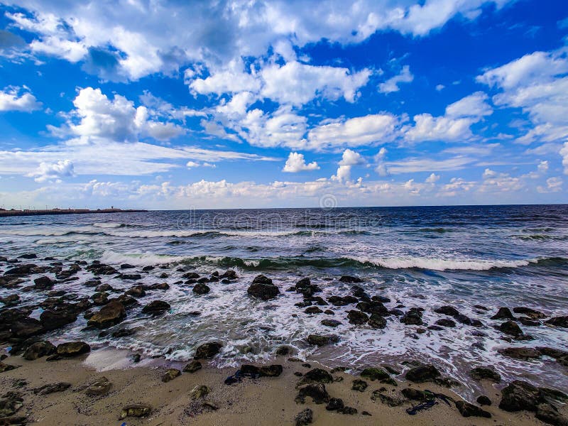 Seashore with Sky , Cloud & Rocks in Alexandria Egypt Stock Photo ...