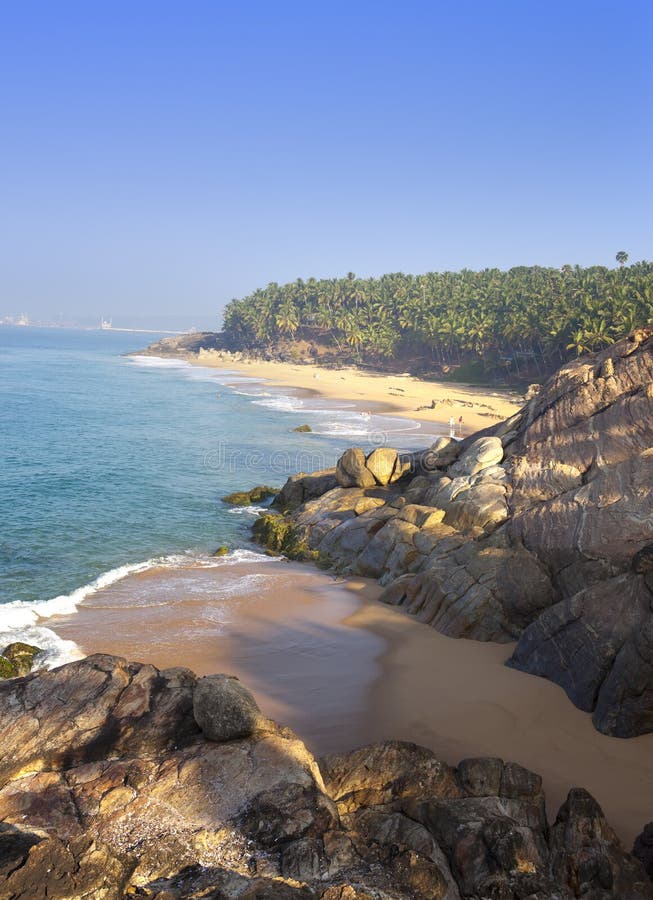 The Seashore with Stones and Palm Trees. India. Kerala Stock Photo ...