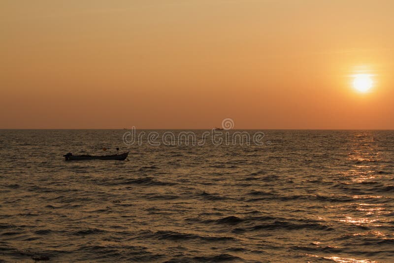 From Seashore during Sunset Stock Photo - Image of beautiful, boating ...