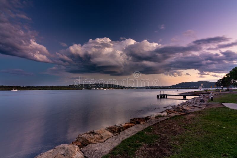 Seashore of the Tranquil Sea Under a Sunset Sky Stock Photo - Image of ...