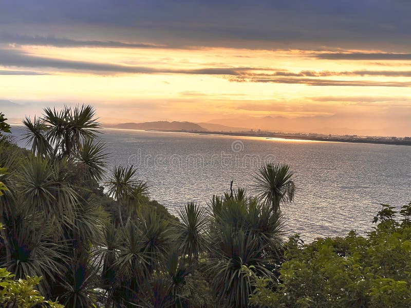 Seashore under the sunset stock image. Image of travel - 256726881