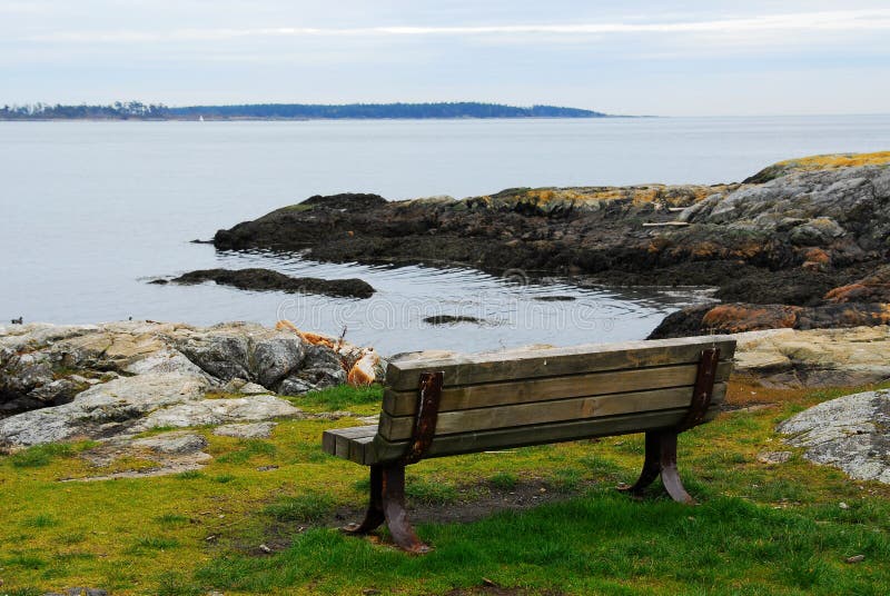Seaside bench stock photo. Image of oceanfront, island - 4565460