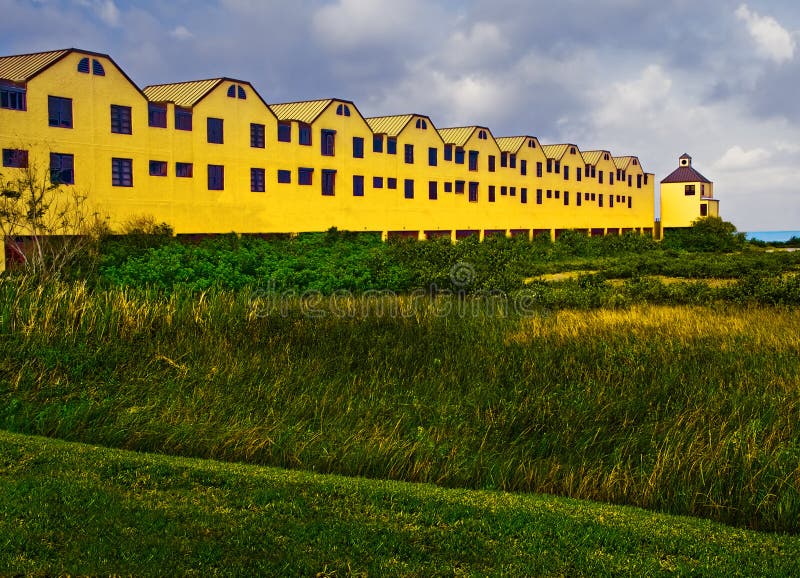 Seaside Building and Grassland Stock Image - Image of breeze, roof ...