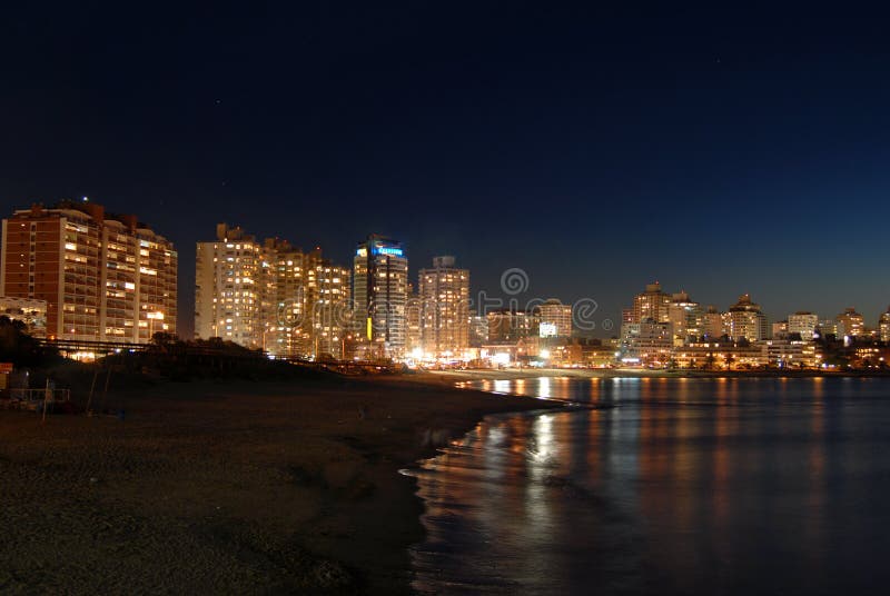 Seaside buildings at night stock photo. Image of colorful - 9025678