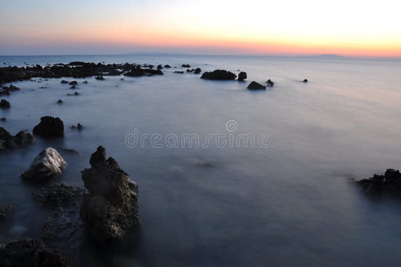 Seaside Full of Sharp Rocks Stock Photo - Image of reflection, beach ...