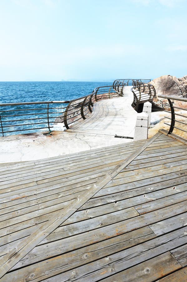 Seaside Plank Road with Deck Stock Photo - Image of pavilion, clouds ...