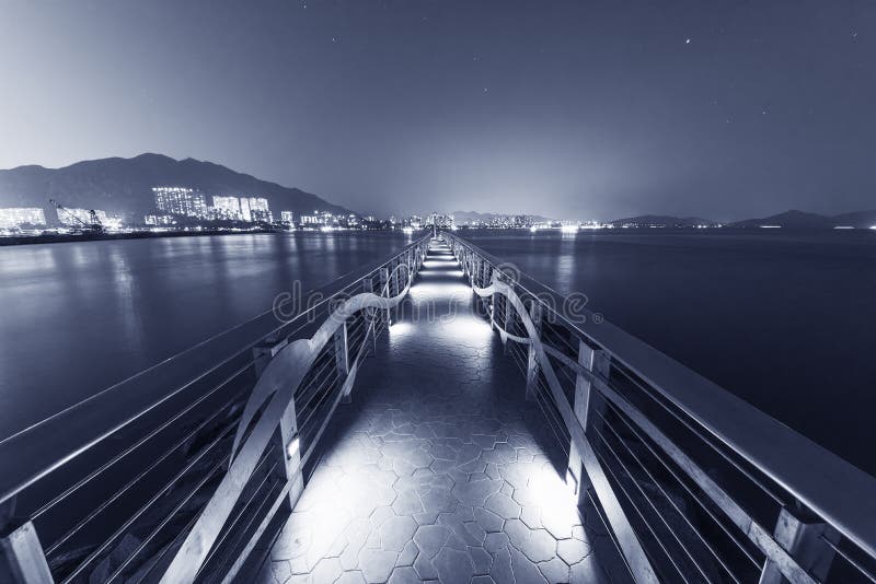 Seaside Promenade in Harbor Stock Image - Image of bridge, illuminate ...