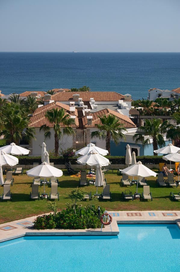 Seaside resort stock photo. Image of swimming, parasol - 2538952