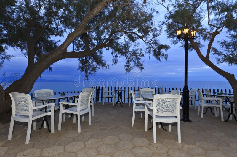 Seaside restaurant stock photo. Image of chair, summer - 17897460