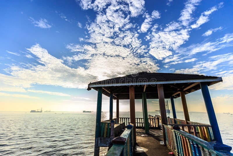 Seaside stock image. Image of seaside, blue, cloud, roof - 74369835